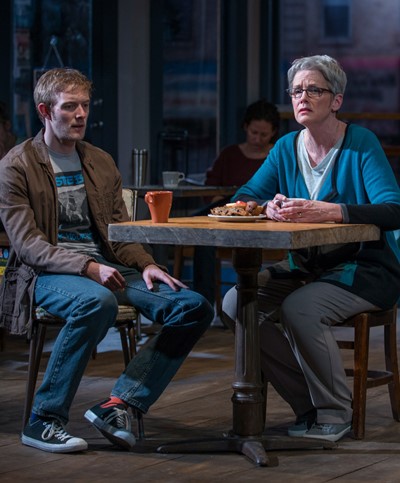 Jamie (Brett Schneider) and his mother (Jan Radcliff) discuss his ...